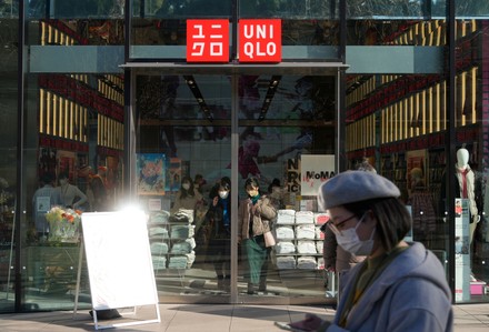 Passerby Walks Past Uniqlo Store Tokyo Editorial Stock Photo - Stock ...