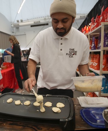 Vendor Prepares Food Samples Booth During Editorial Stock Photo - Stock ...