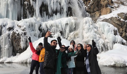 Tourists Take Pictures Near Frozen Waterfall Editorial Stock Photo ...