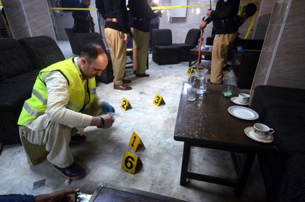Police Officer Examines Crime Scene Following Editorial Stock Photo ...
