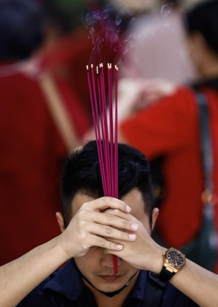 Devotee Holds Incense Sticks While Praying Editorial Stock Photo ...