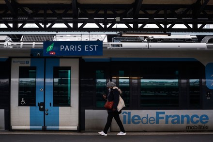Commuter Walks By Train Along Platform Editorial Stock Photo - Stock ...