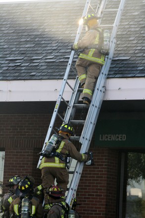 Firefighters Climb Ladder On Roof Burning Editorial Stock Photo - Stock ...