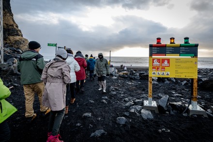 Tourists Walk Near Informative Sign Warning Editorial Stock Photo ...