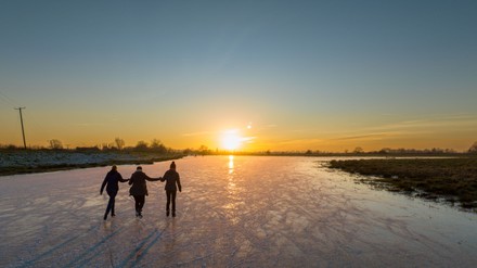People Skating On Frozen Fen Near Editorial Stock Photo - Stock Image ...
