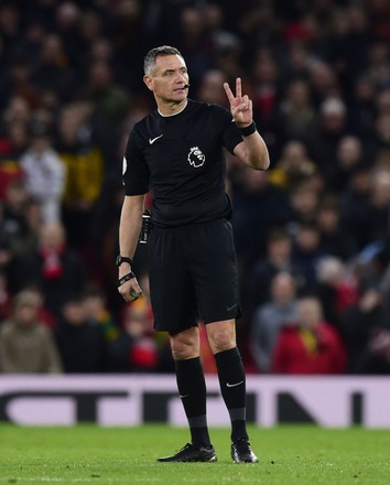Referee Andre Marriner Signals 2 Minutes Editorial Stock Photo - Stock ...