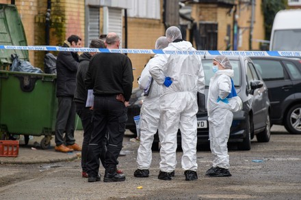 Forensic Investigators Inside Cordon On Argosy Editorial Stock Photo ...