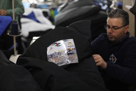 __COUNT__ Palestinian employees work on an order of custom-made cold ...