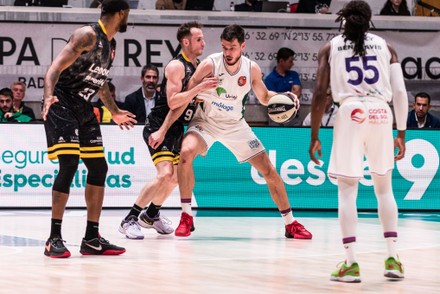 Jonathan Barreiro Unicaja Action Against Marcelinho Editorial Stock ...