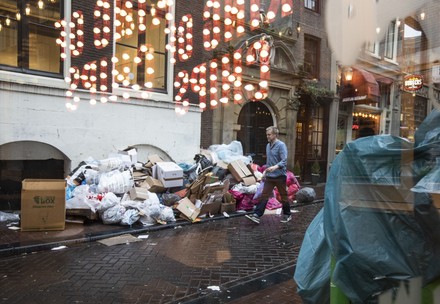 Amsterdam Tourists Walk Past Garbage During Editorial Stock Photo ...