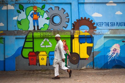 Man Walks Past Mural Depicting Environmental Editorial Stock Photo ...