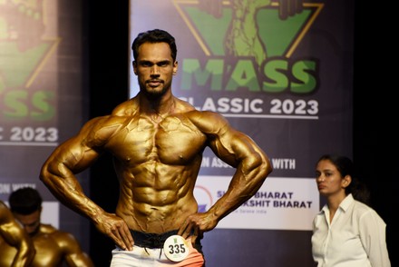 Competitor Flexes His Muscles During Body Editorial Stock Photo - Stock ...