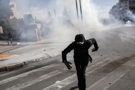Hooded Man Runs Away During Clashes Editorial Stock Photo - Stock Image ...