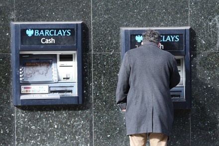 Man Uses Cash Point Machine Outside Editorial Stock Photo - Stock Image ...
