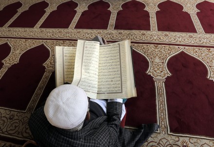 Man Reads Koran On First Day Editorial Stock Photo - Stock Image ...