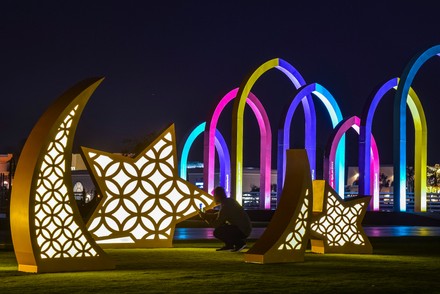 People Walk Past Crescent Moonshaped Decorations Editorial Stock Photo ...