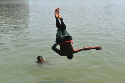 Boy Jumps Into Ganges River Cool Editorial Stock Photo - Stock Image ...