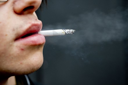 20,000 Smoking cigarette Stock Pictures, Editorial Images and Stock ...