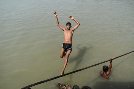 Boy Jumps Into Ganges River Cool Editorial Stock Photo - Stock Image ...