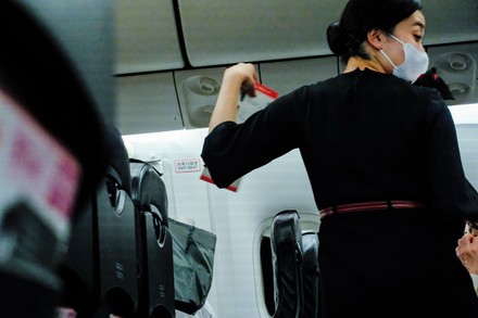 Female Jal Cabin Attendant Wearing Surgical Editorial Stock Photo ...