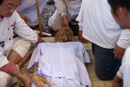 __COUNT__ The tradition of exhuming bodies that have been buried for a ...
