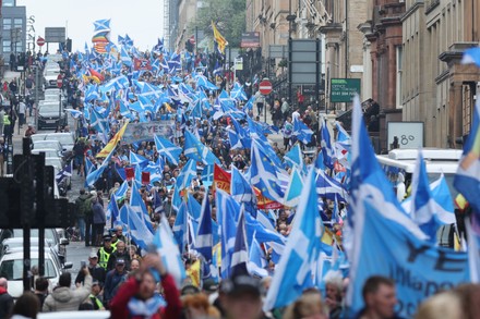 9,000 March with flags Stock Pictures, Editorial Images and Stock ...