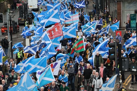 9,000 March with flags Stock Pictures, Editorial Images and Stock ...