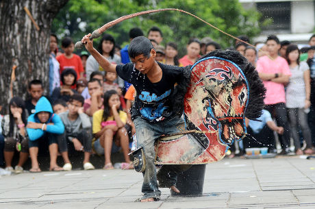 Child Whip Rides Bamboo Horse During Editorial Stock Photo - Stock ...