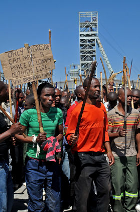 Lonmin Marikana Platinum Mine workers strike over wage demands ...