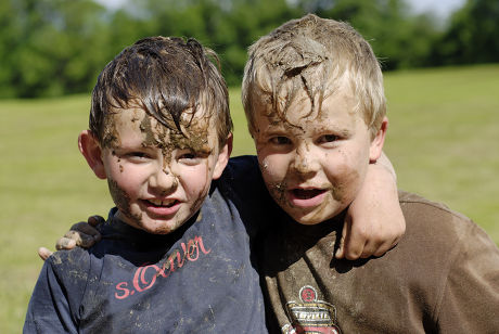 Model Released Two Friends Covered Mud Editorial Stock Photo - Stock ...