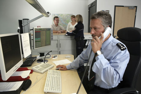 Police Officer Making Phone Call Office Editorial Stock Photo - Stock ...