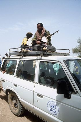 Armed Man On Roof Unhcr Vehicle Editorial Stock Photo - Stock Image ...