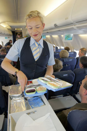 Flight Attendant Serving Cabin Aeroplane Editorial Stock Photo - Stock ...