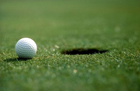 Golf Ball Beside Hole Editorial Stock Photo - Stock Image | Shutterstock