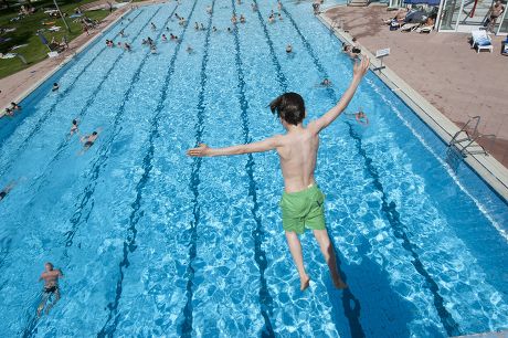 Boy Diving Into Public Swimming Pool Editorial Stock Photo - Stock ...