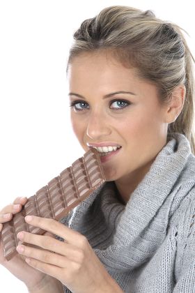 Model Released Woman Eating Chocolate Bar Editorial Stock Photo - Stock ...