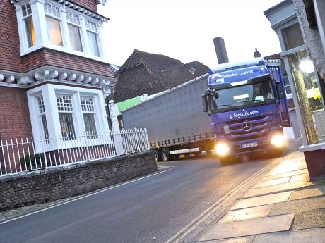 Large Lorries Driving Through Narrow Streets Editorial Stock Photo ...