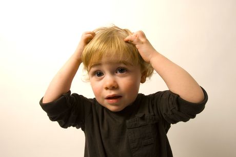 Boy Scratching Head Editorial Stock Photo - Stock Image | Shutterstock