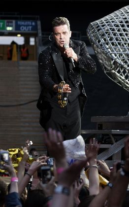 Robbie Williams in concert during his Take The Crown Tour, Wembley ...