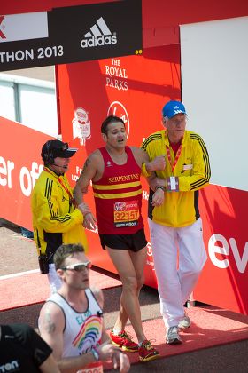 Runner Collapses Just Before Finish Line Editorial Stock Photo - Stock ...