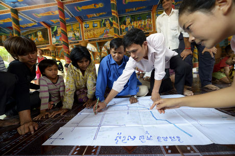 50 Discussing a map Stock Pictures, Editorial Images and Stock Photos ...
