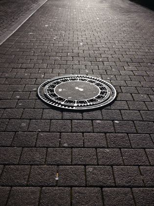 Manhole Cover On Paved Walkway Freiburg Editorial Stock Photo - Stock ...