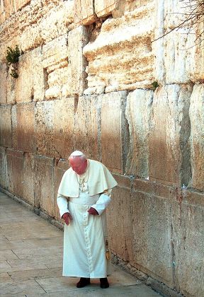 2 26.3.2000 pope john paul ii inserts a personal message into a crack ...