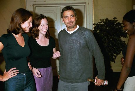 2 Jessica callan eva simpson polly graham journalist holding bottle of ...