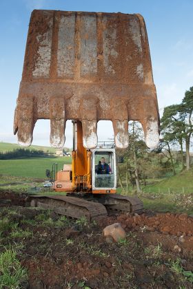 Excavator Digging Stone On Hillside England Editorial Stock Photo ...