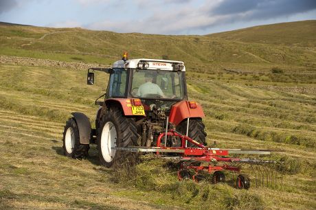 Styer 9078 Tractor Rowing Grass On Editorial Stock Photo - Stock Image ...