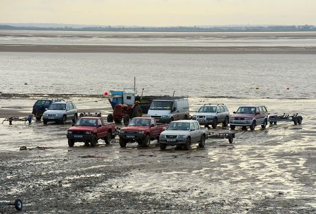 Licensed Cockle Pickers Vehicles On Shore Editorial Stock Photo - Stock ...