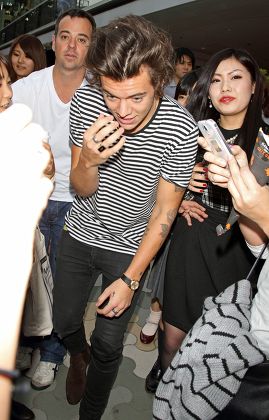 Harry Styles Surrounded By Fans Editorial Stock Photo - Stock Image ...