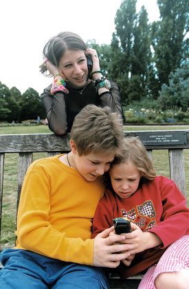 Children Using Their Mobile Phones Editorial Stock Photo - Stock Image ...