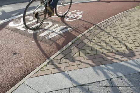 Cyclist On Cycle Lane Displaying Slow Editorial Stock Photo - Stock ...